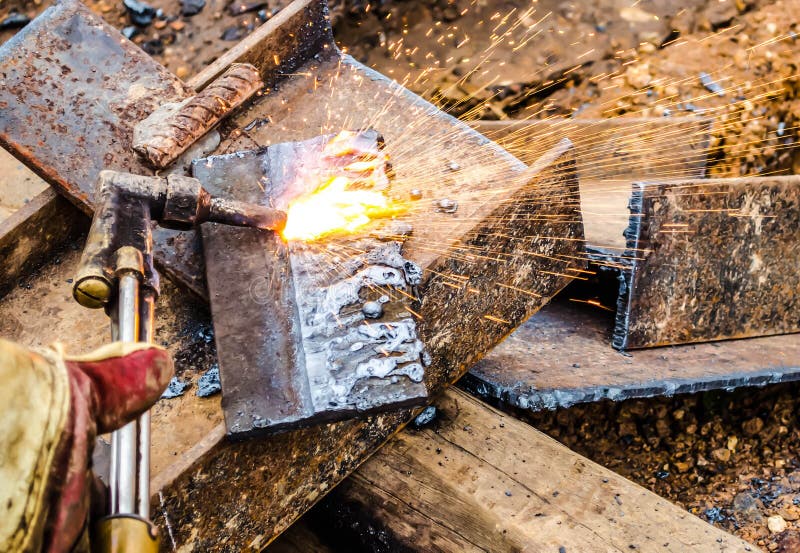 Photo of Worker Doing Gas Cutting on Steel Stock Photo - Image of steel ...