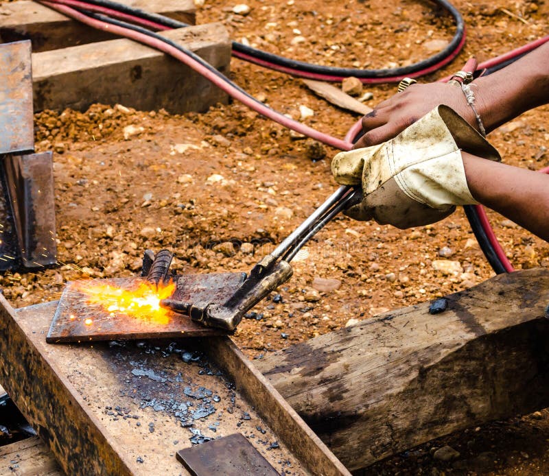 Photo of Worker Doing Gas Cutting on Steel Stock Photo - Image of steel ...