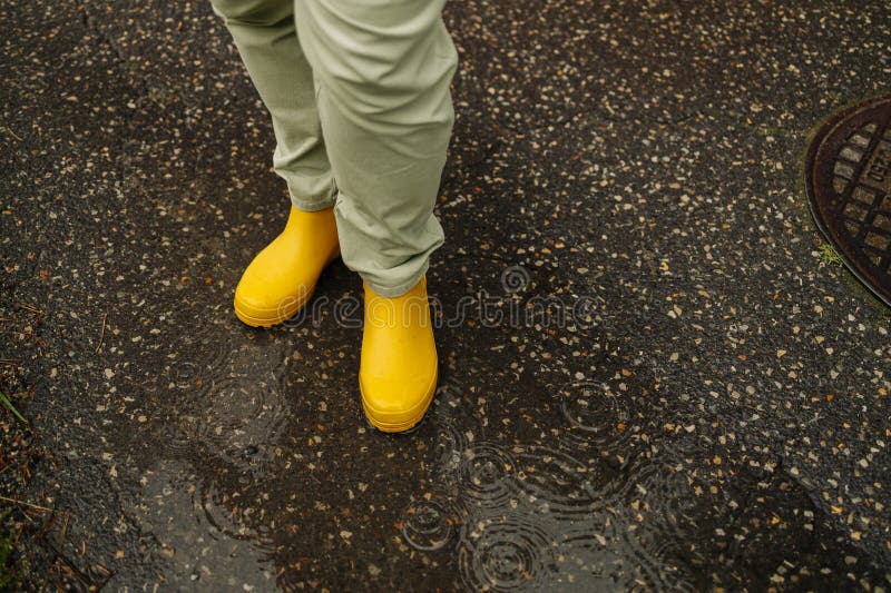 Photo of Yellow Rubber Boots in a Building Under Construction. these ...