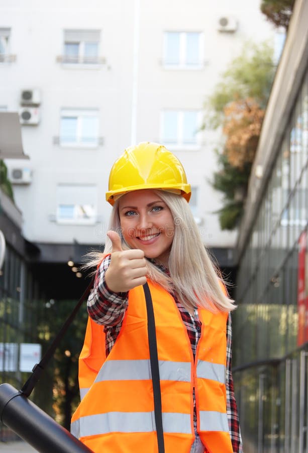 Photo3. a Young Lady. a Civil Engineer. Stock Photo - Image of building ...