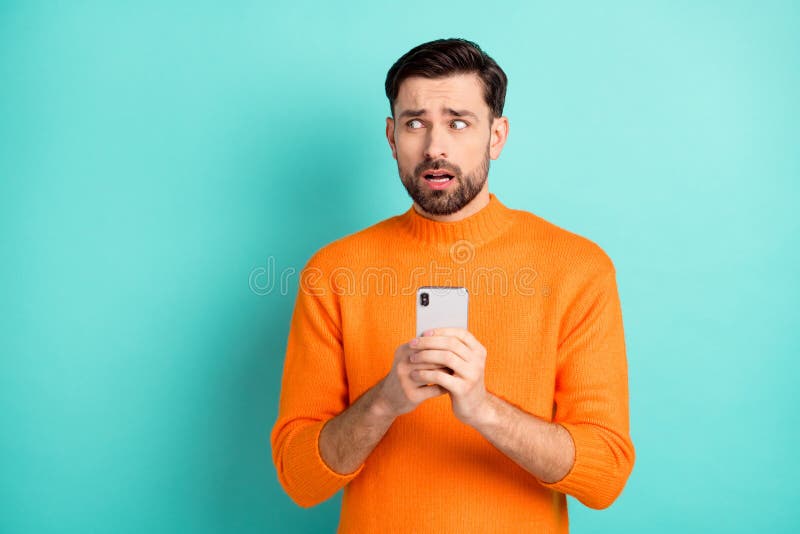 Photo of Young Man Afraid Scared Nervous Use Cellphone Look Empty Space ...
