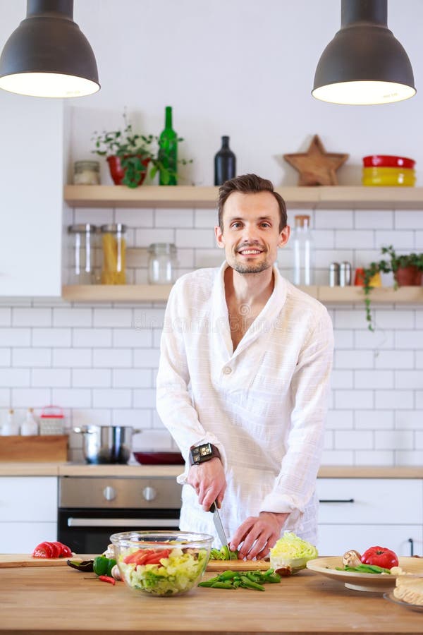 Photo of Young Man Cooking Food Stock Image - Image of home, homemade ...