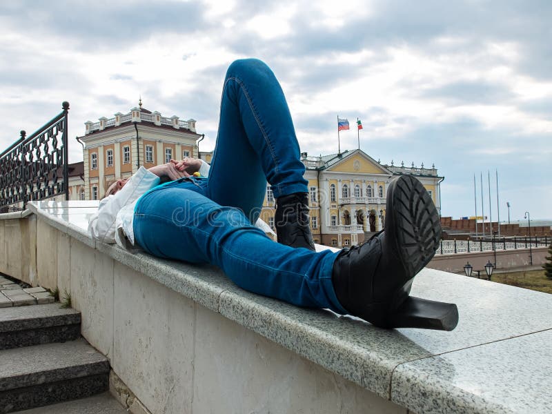 Photo of Young Woman Lying on the Railing Stock Image - Image of adult ...