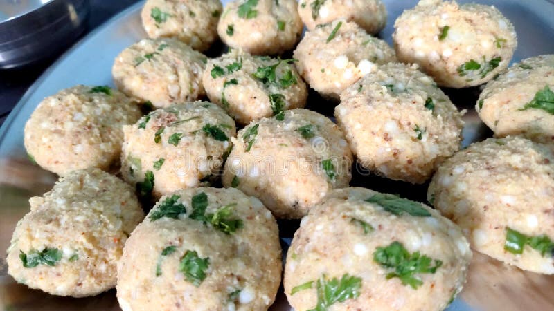 Photograph of Aloo Tikki Chaat Making Stock Photo - Image of lemon ...