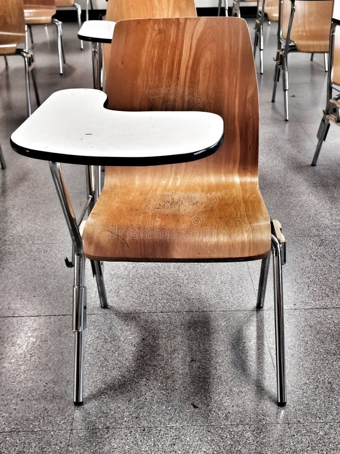 A Photograph of a Classroom Chair Designed for Note-taking, Showing ...