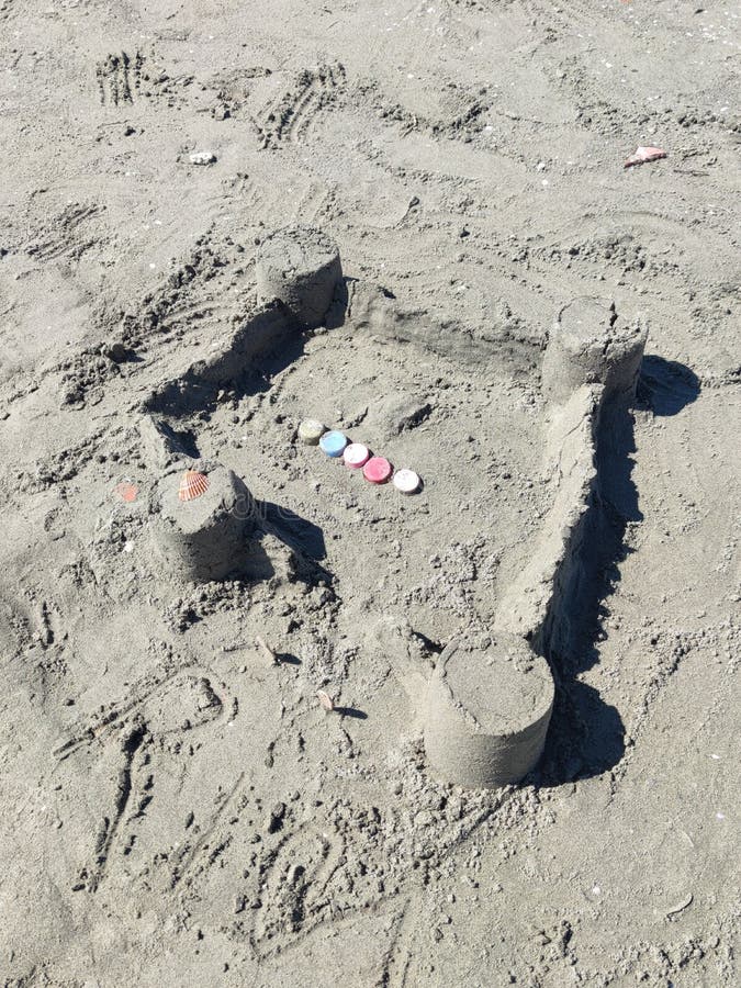 Photograph of a Four-tower Sand Castle Stock Image - Image of wood ...