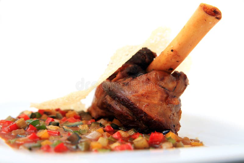 Lamb Shank Bone Portion with Vegetable Cut on White Background Stock ...