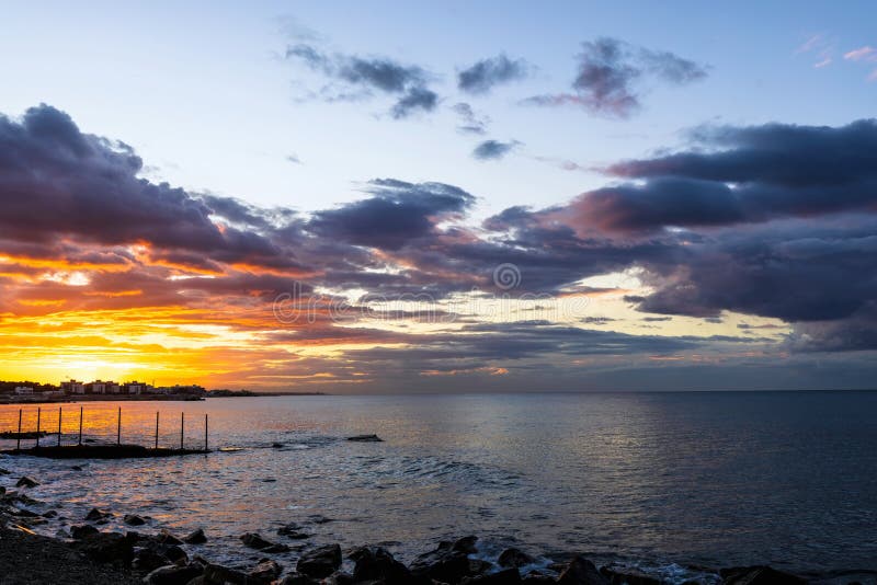 Sunset on the Coast with Cloud Body Stock Image - Image of dusk, sunset ...