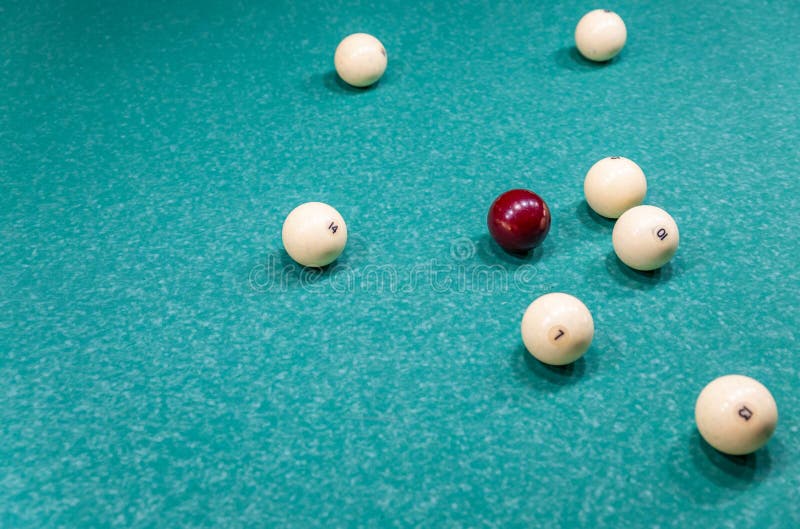 A Photograph of a Pool or Billiards Table in an Interestingly Lit Bar ...