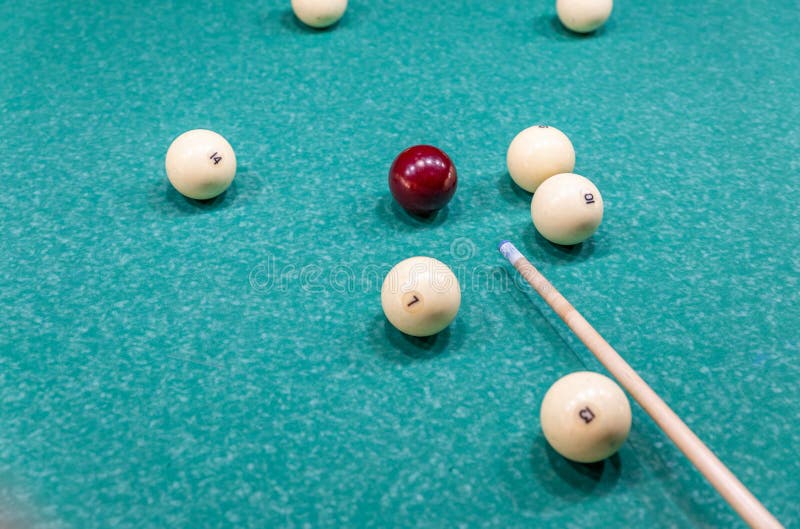 A Photograph of a Pool or Billiards Table in an Interestingly Lit Bar ...