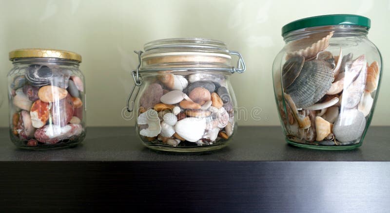Photograph Representing Three Jars Full of Shells Stock Image - Image ...