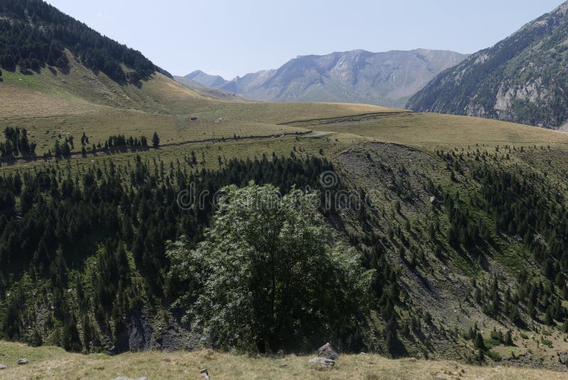 A Path Crosses the Mountainside. Stock Image - Image of blue ...