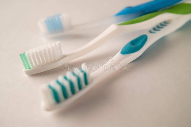 Photograph with Shallow Depth of Field of Toothbrushes on a White ...