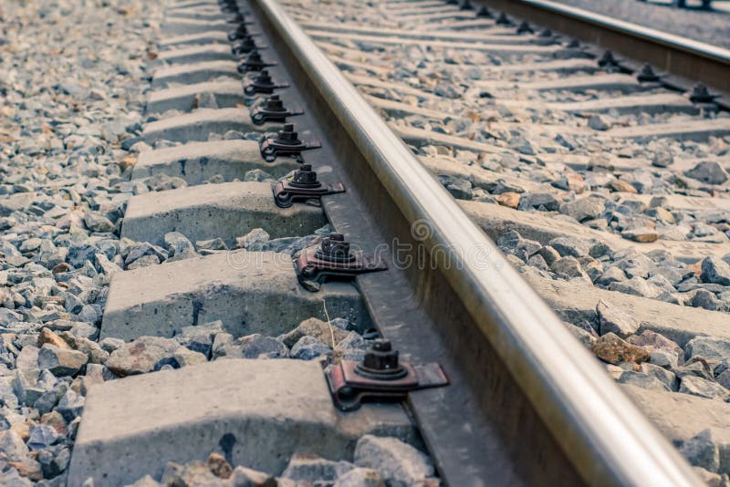 Photograph of Some Train Rails Stock Image - Image of rocks, stones ...