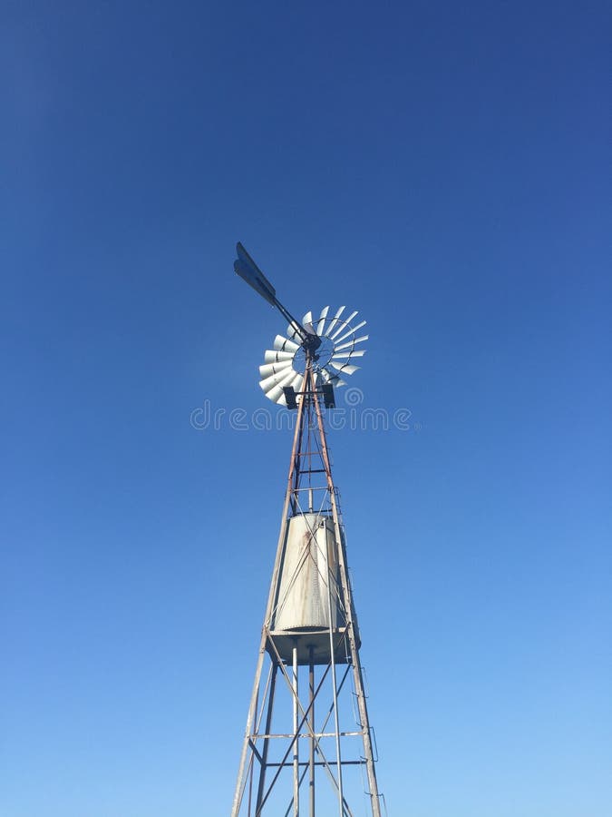 Photograph of a Windmill in the Field Stock Image - Image of generator ...