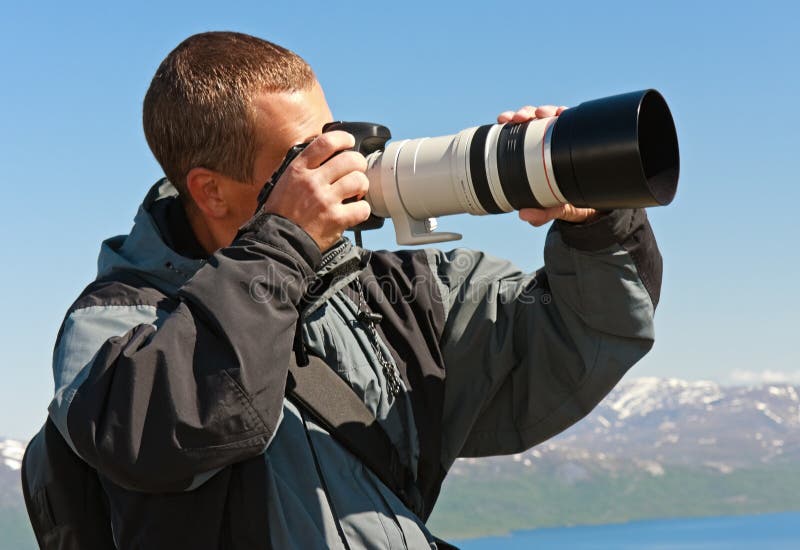 Photographer stock image. Image of large, taking, huge - 1499557