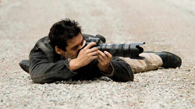 Photographer stock image. Image of shoot, lens, male, shooting - 4695631