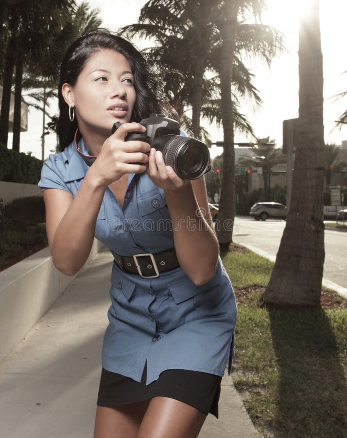 Photographer in action stock image. Image of pose, outside - 10939859