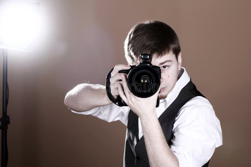 Photographer with camera stock image. Image of photographing - 22857047