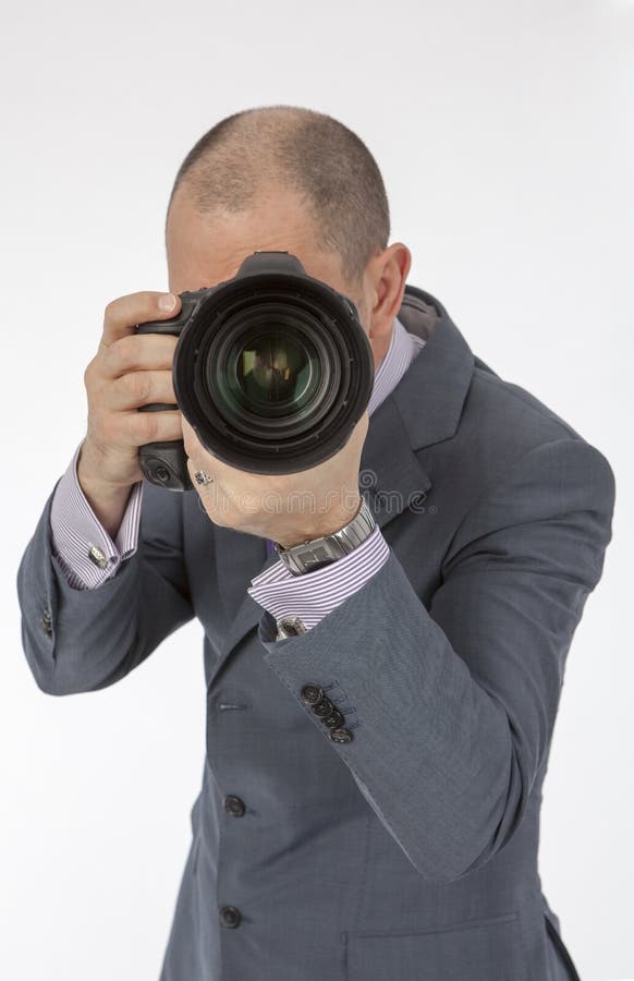 Photographer with camera stock image. Image of highlight - 28257459