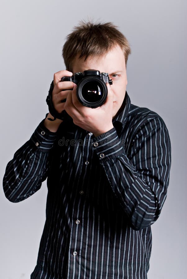 Photographer with camera stock image. Image of black, photographing ...