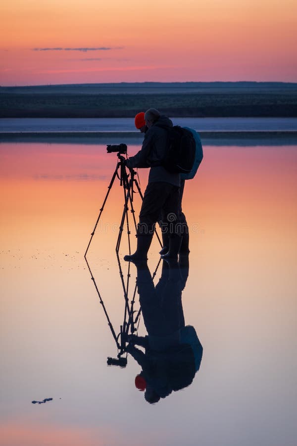 Photographer Captures Serene Sunset Reflection in Tranquil Waters Stock ...