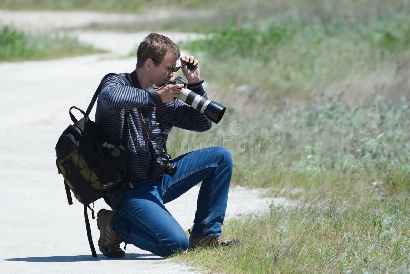 Photographer Chooses a Foreshortening Stock Photo - Image of camera ...