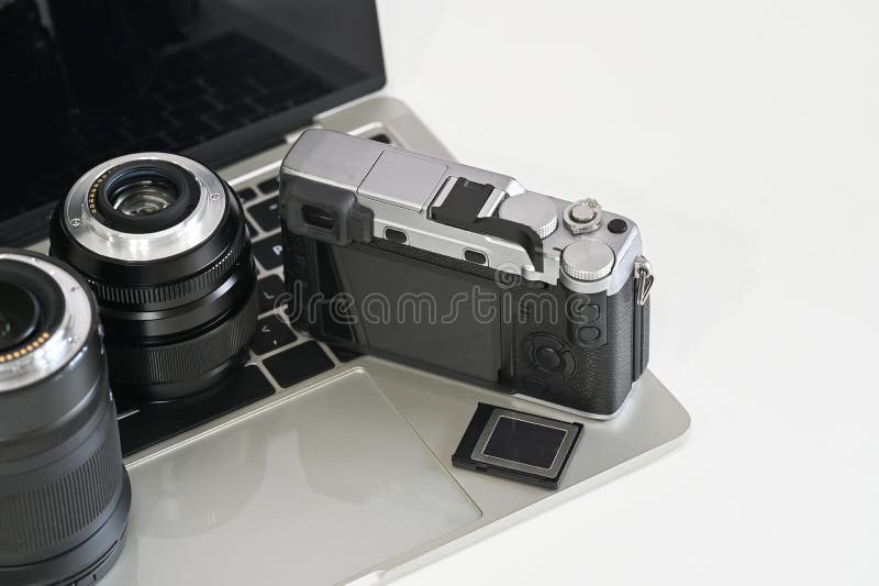 Photographer Desk with Camera, Lens, Laptop and Memory Stock Image ...