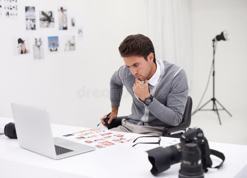 Photographer, Editing and Thinking with Computer in Office with Working ...