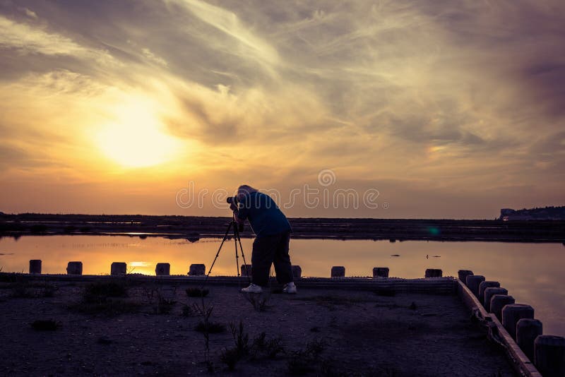 Photographer Getting a Shot of the Setting Sun Stock Image - Image of ...