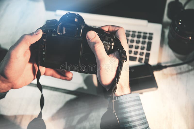 Photographer Hand Camera on Desk. Stock Image - Image of designer ...