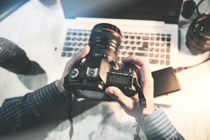 Photographer Hand Camera on Desk. Stock Image - Image of device ...