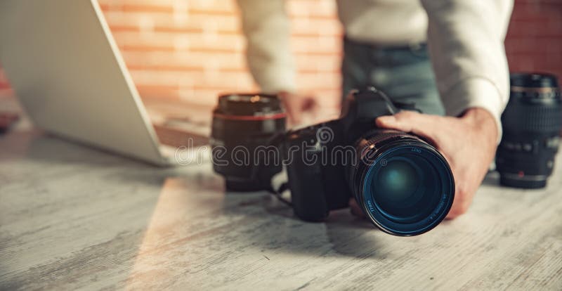 Photographer Hand Camera Working in Desk. Stock Photo - Image of studio ...