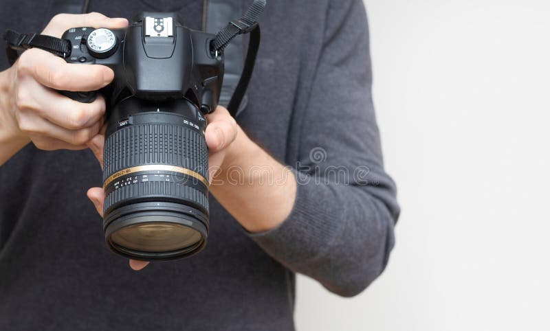 Photographer Hands Holding Camera Stock Image - Image of fingers ...