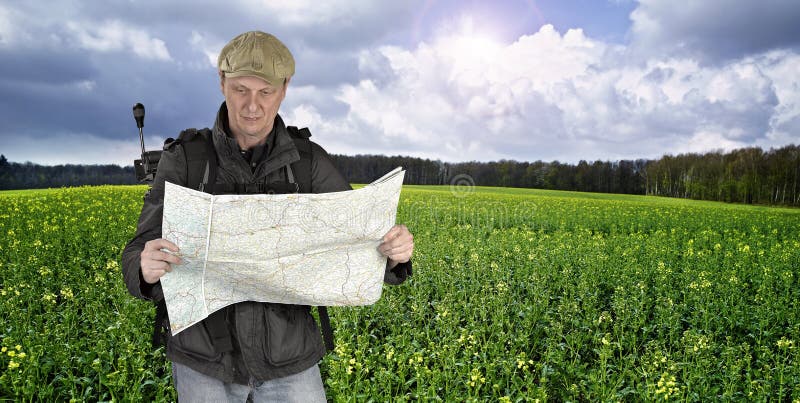 Photographer Hiker with Map Stock Image - Image of fields, cartography ...