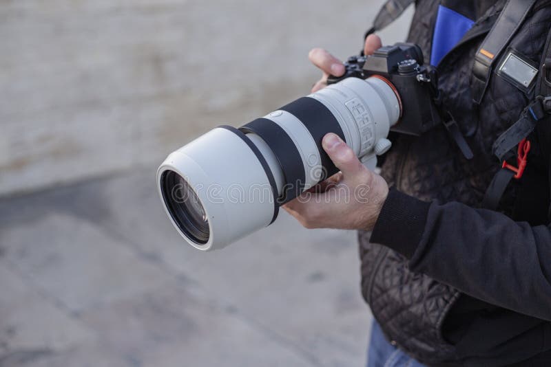 Photographer Holding a Camera Stock Image - Image of travel, nature ...