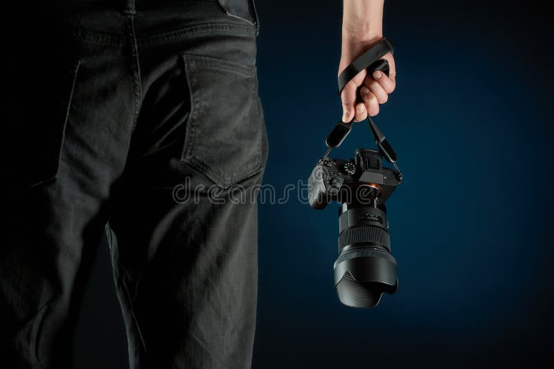 Dangling mirrorless camera stock photo. Image of dangle - 304879504