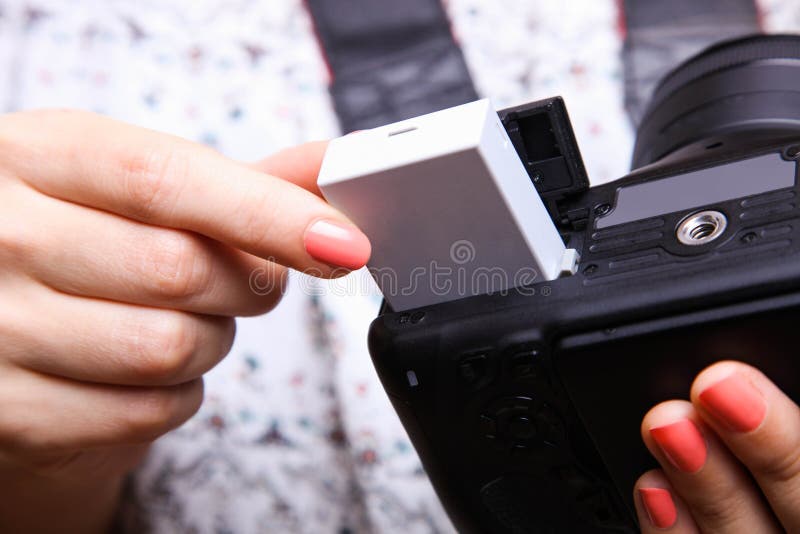Photographer Inserts Battery Stock Photo - Image of woman, concept ...
