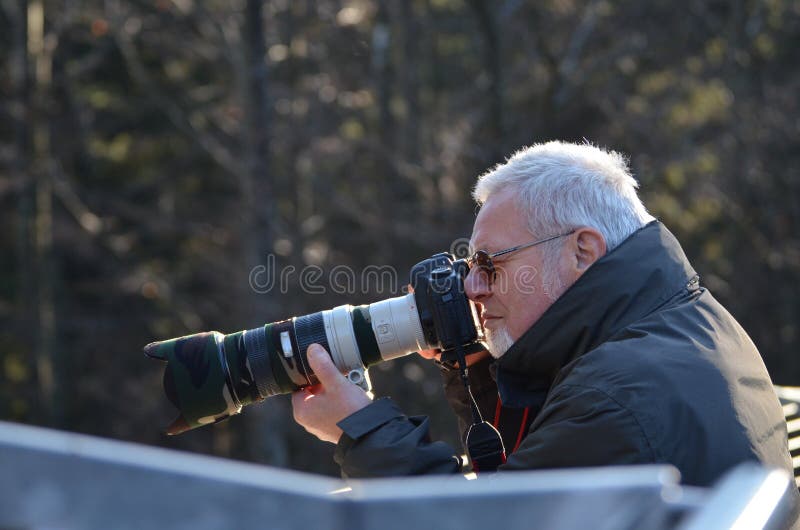 Photographer with a Long Objective Stock Photo - Image of focus, nature ...
