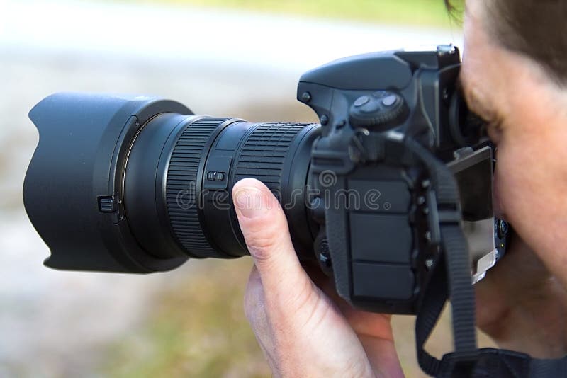 Photographer Looks in the Viewfinder of the Camera Closeup Stock Photo ...