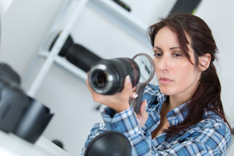 Photographer with Magnifying Glass Looking into Lens Stock Image ...