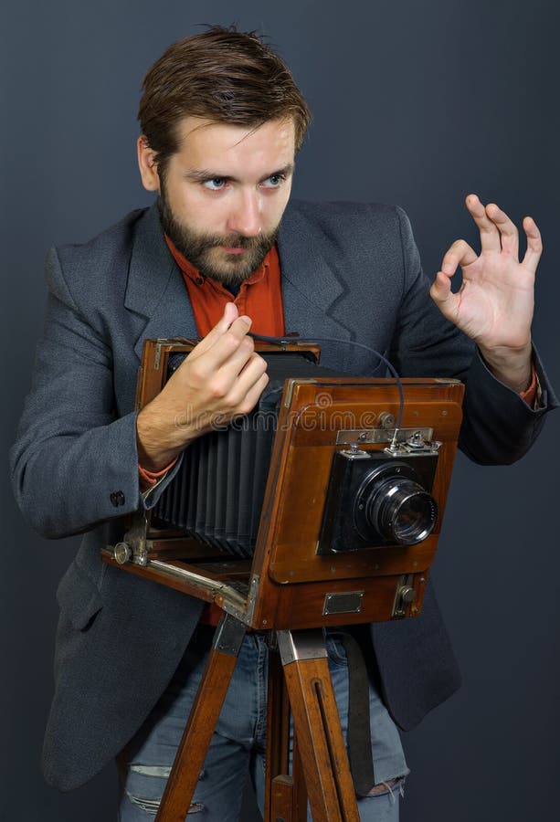 Photographer with an Old Camera Stock Image - Image of photograph ...