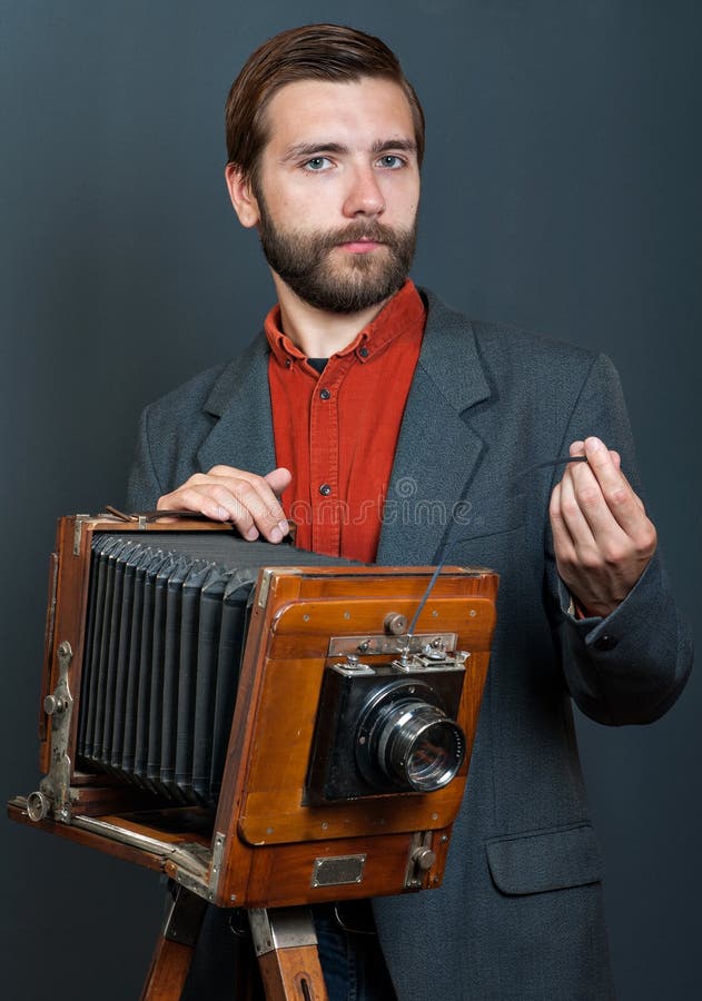 Photographer with an Old Camera Stock Photo - Image of photograph ...