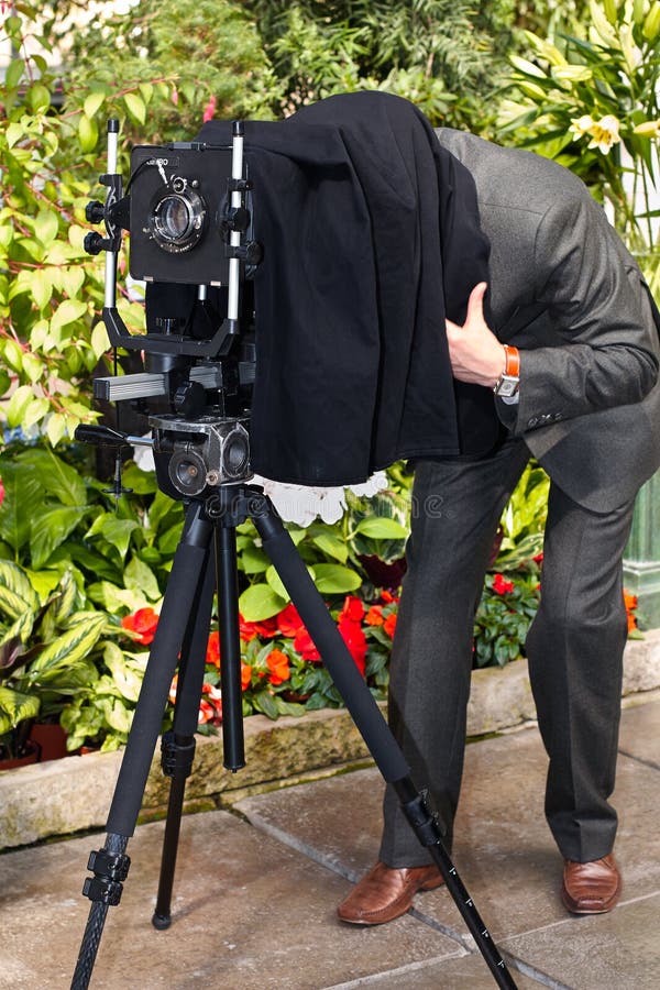 The Photographer Photographs the Old Camera on a Large Format. Stock ...