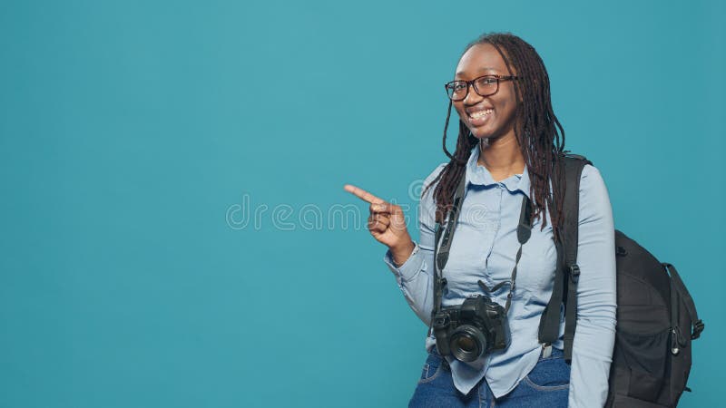Photographer Pointing at Left and Right Side in Studio Stock Photo ...
