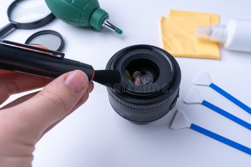 Cleaning Camera Lens with Cloth and Spray Stock Photo - Image of spray ...