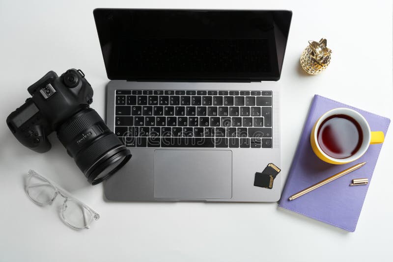 Photographer`s Workplace with Laptop and Camera on Table Stock Image ...