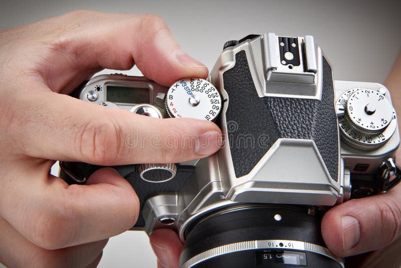Photographer Setting Shutter Control Dial on Retro SLR Camera Stock ...