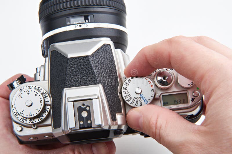 Photographer Setting Shutter Control Dial on Retro SLR Camera Stock ...