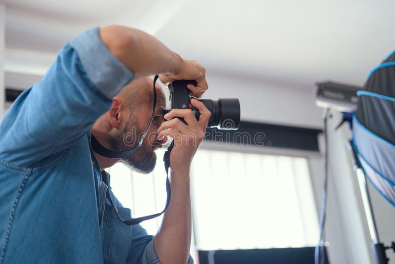 Photographer Shooting a Model in a Studio with a Softbox Stock Image ...